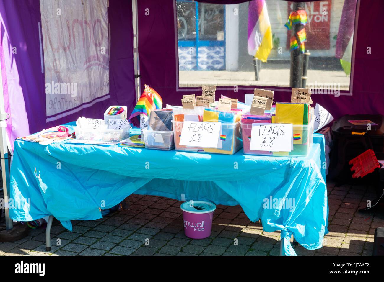 A stall selling pride flags and badges etc in Truro, Cornwall,uk Stock ...
