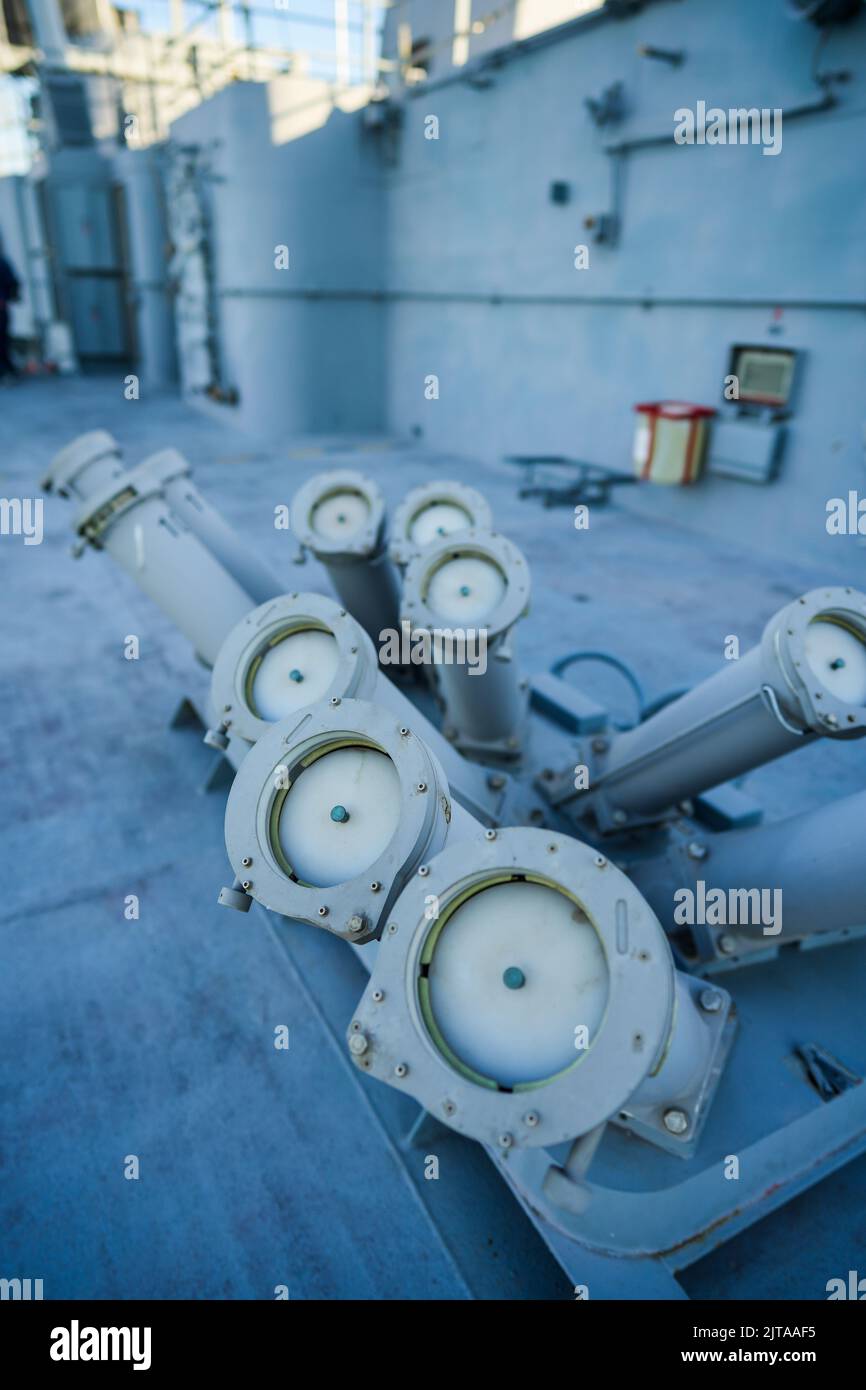 Chaff launcher is seen on the deck of a military ship sailing on the ...