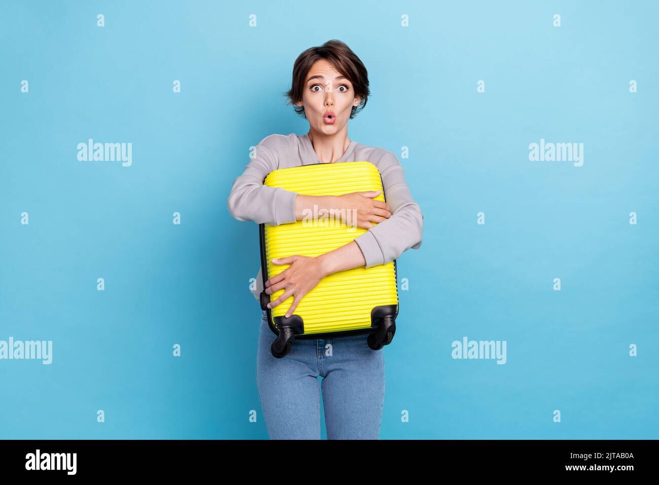 Photo of short hairdo millennial lady hold bag wear shirt jeans ...