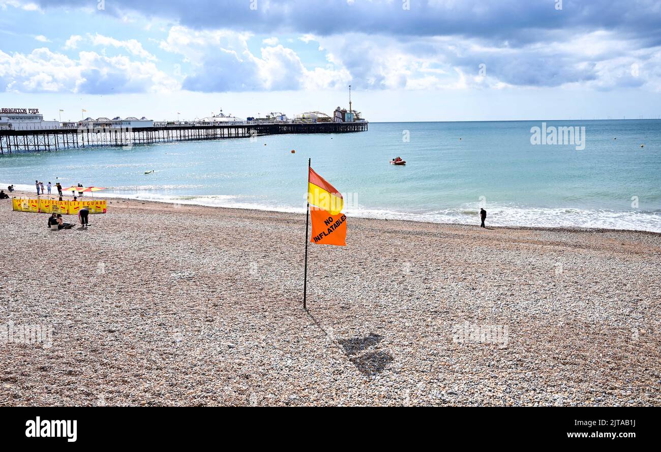 Brighton UK 29th August 2022 - A flag warning people not to use ...