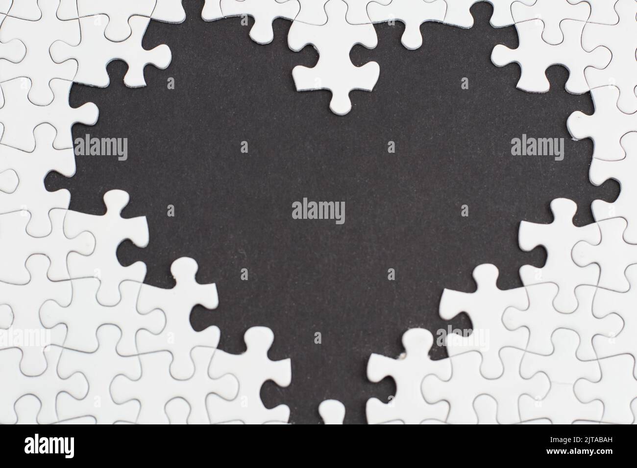 Close-up of blank white puzzle texture background Stock Photo - Alamy