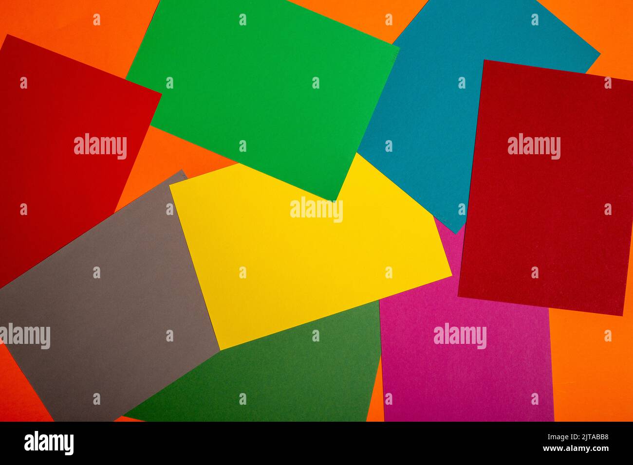 Abstract background of sheets of colored paper, for decoration, for ...