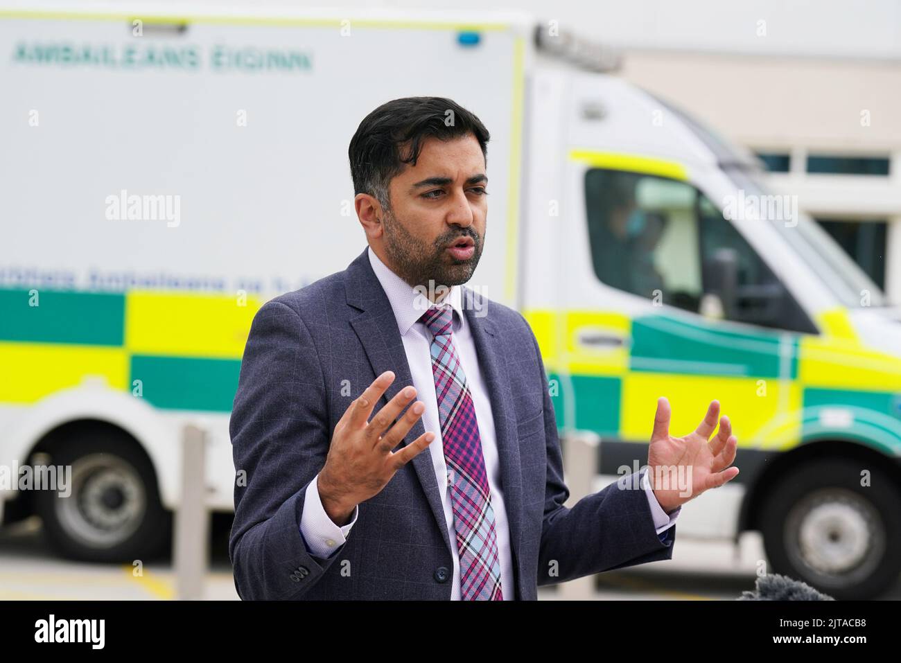 Scottish Health Secretary Humza Yousaf speaks to the media following a ...