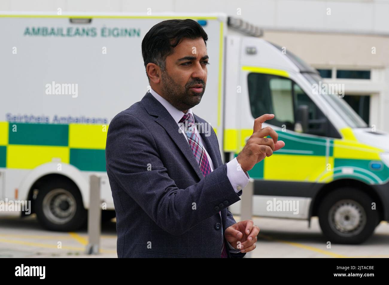 Scottish Health Secretary Humza Yousaf speaks to the media following a ...