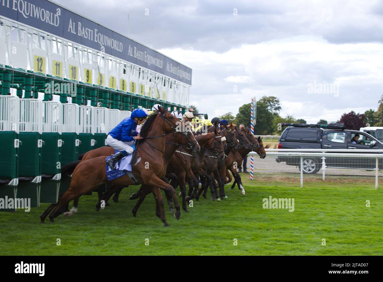 Jockeys and their horses leaving the starting gates during the Al Basti ...