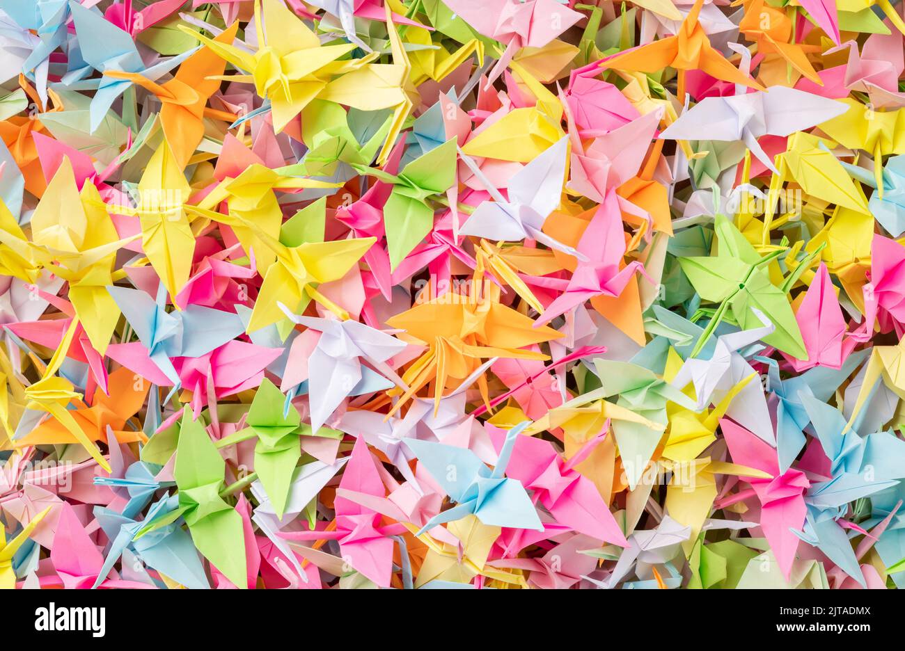 A group of colorful tsuru origamis. Japanese thousand tsurus legend ...