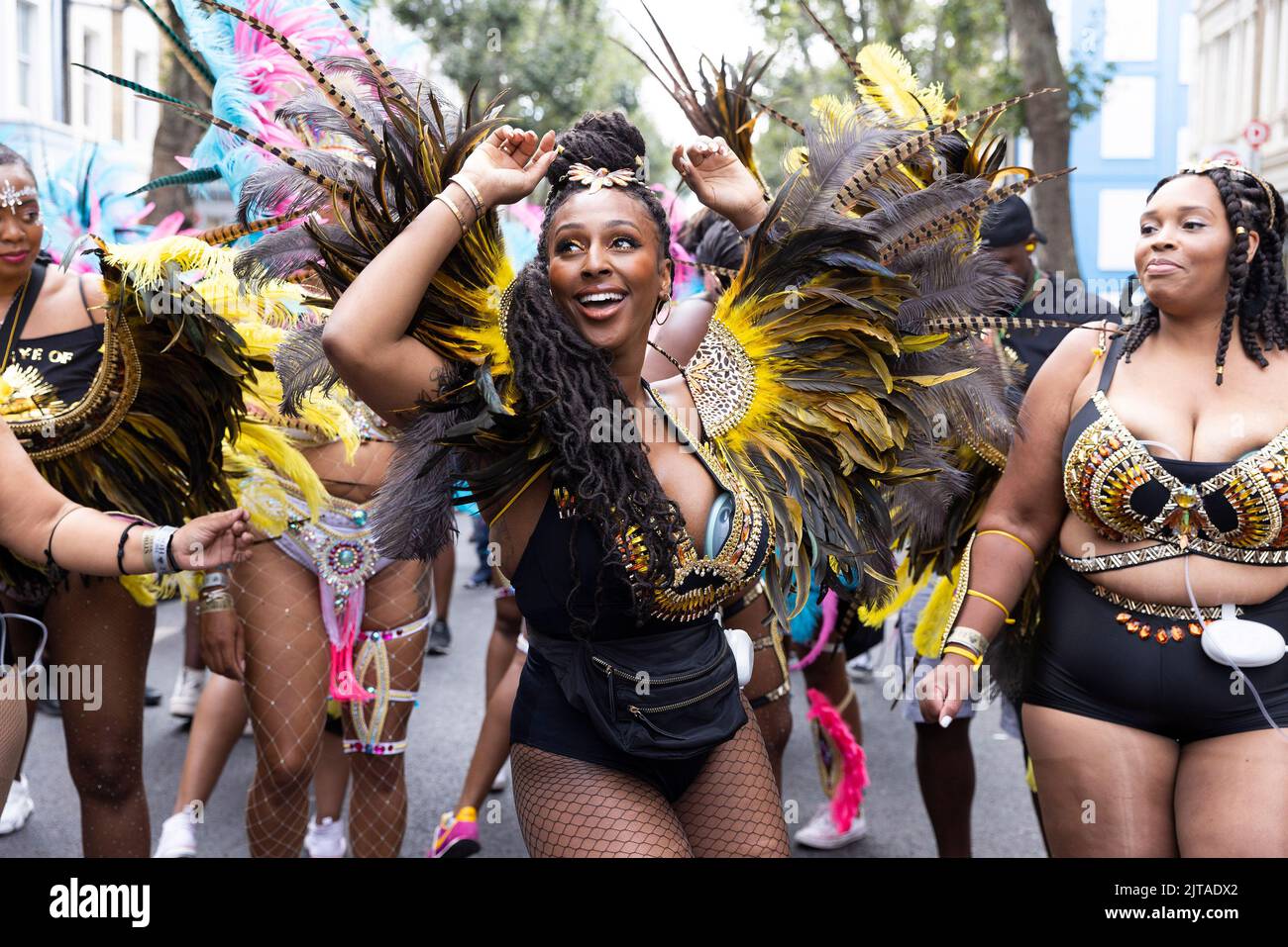 EDITORIAL USE ONLY Alexandra Burke appears alongside The Utopia Band wearing an Elvie Stride ...