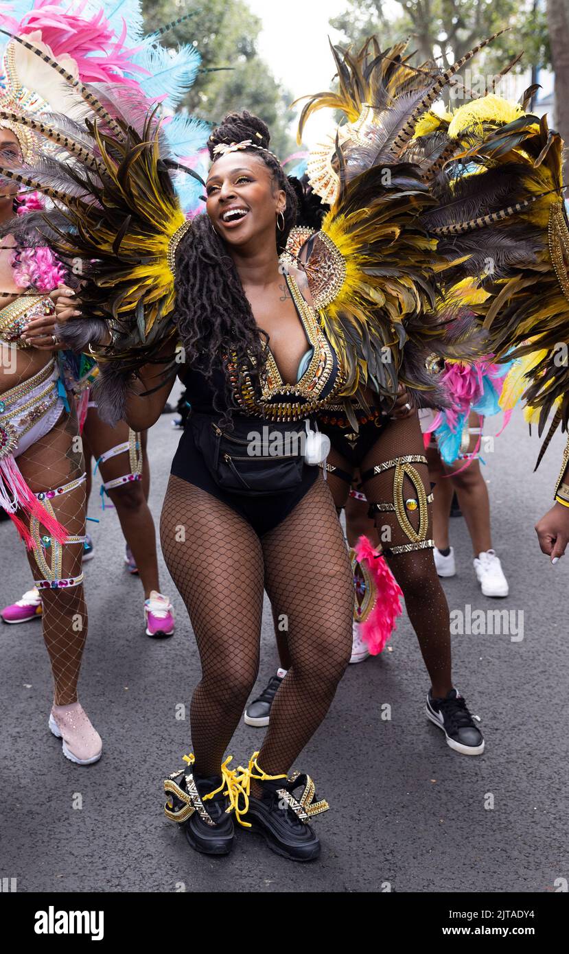 EDITORIAL USE ONLY Alexandra Burke appears alongside The Utopia Band wearing an Elvie Stride ...