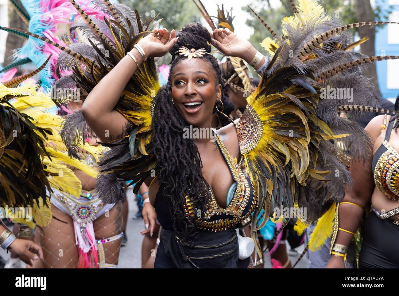 EDITORIAL USE ONLY Alexandra Burke appears alongside The Utopia Band wearing an Elvie Stride ...