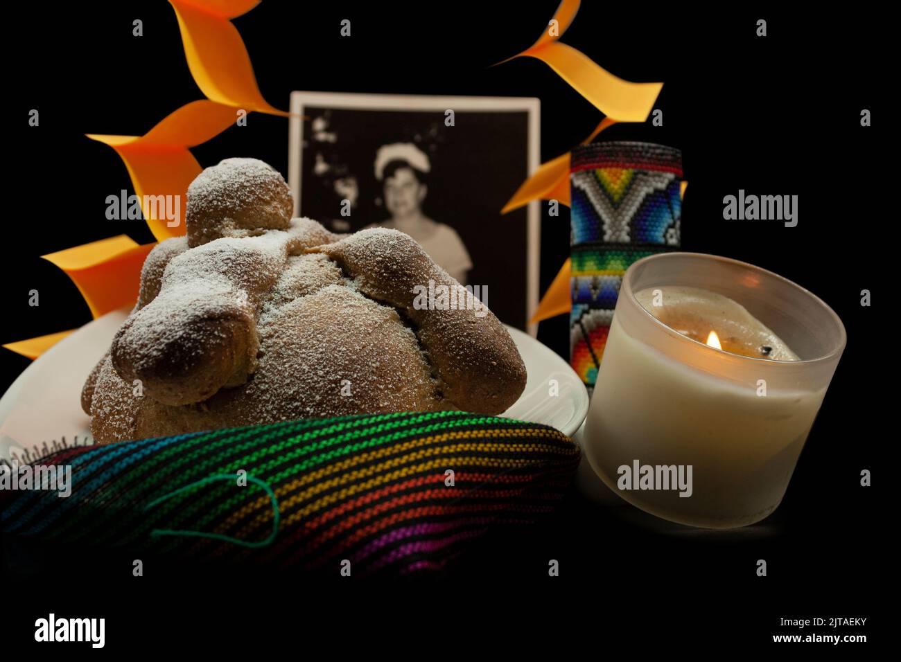 bread of the death decorated with simulated bones on top of overflowing ...