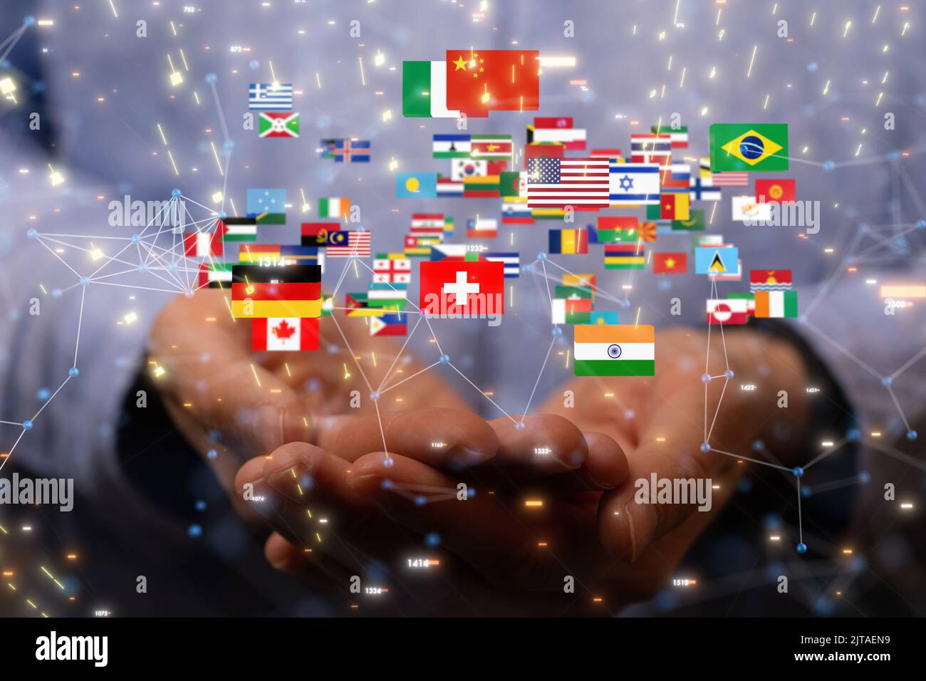 An extensive web of flags from around the world floating on a man's ...