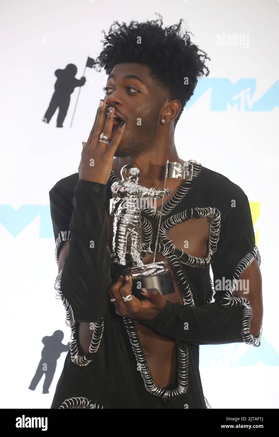 August 28, 2022, Newark, New York, USA: LIL NAS X poses for photos in ...