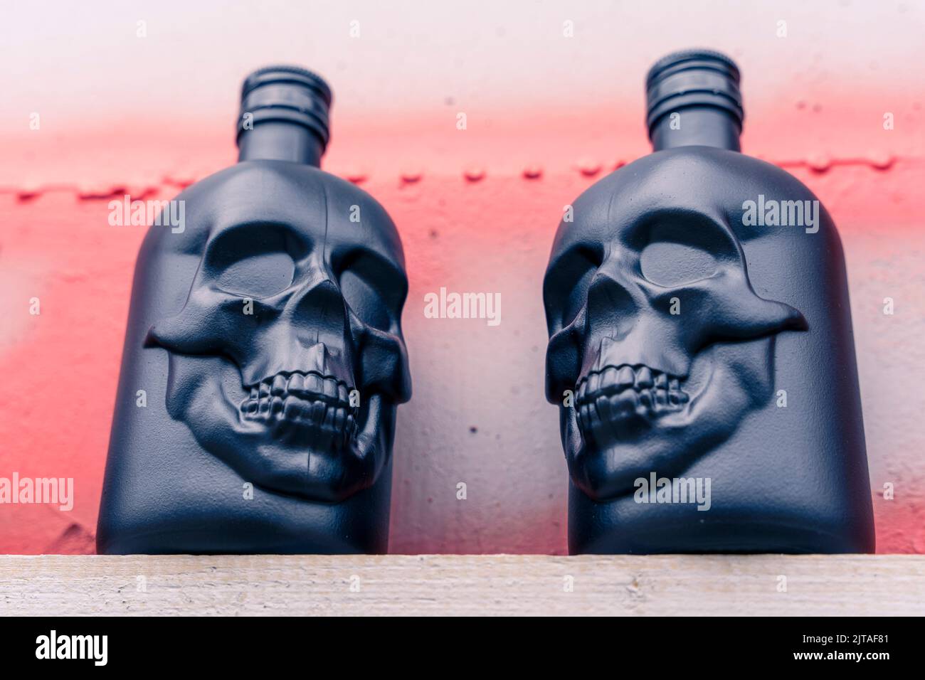 glass bottle in the shape of a human skull. Drink for night party Stock ...