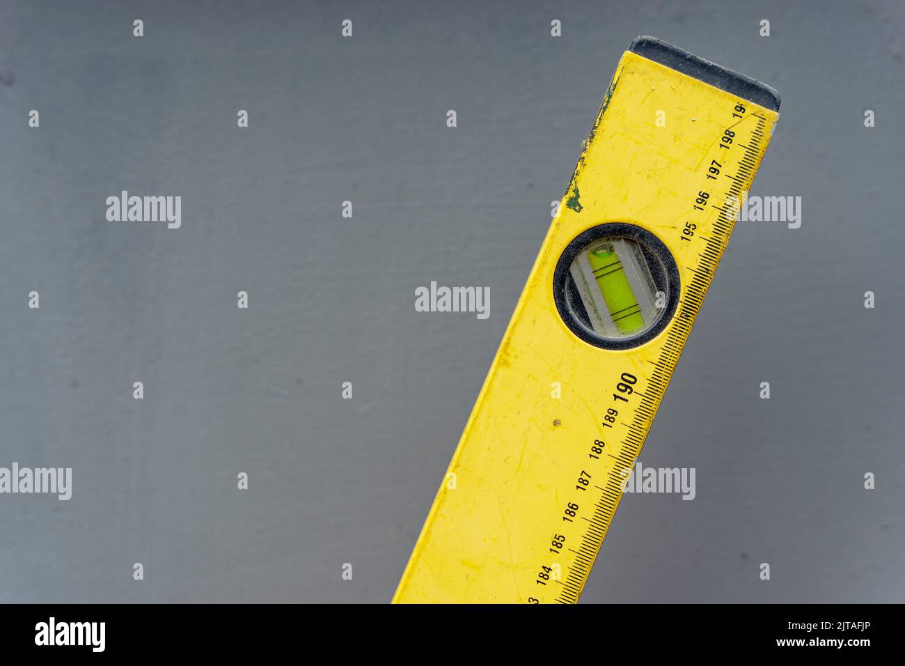 yellow bubble Building level with length markings on a grey background ...