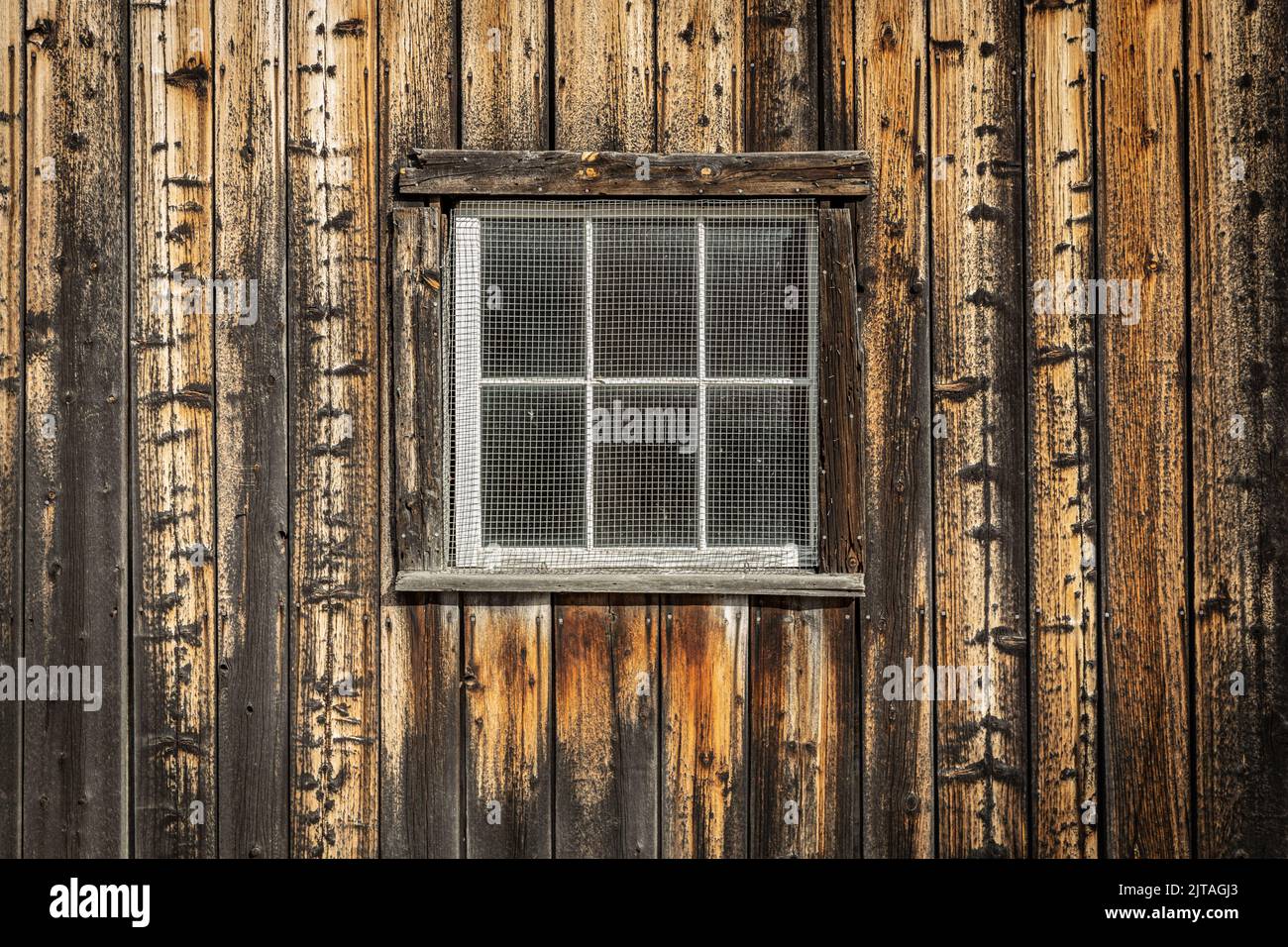 The window of an old barn with aged weathered wood Stock Photo - Alamy