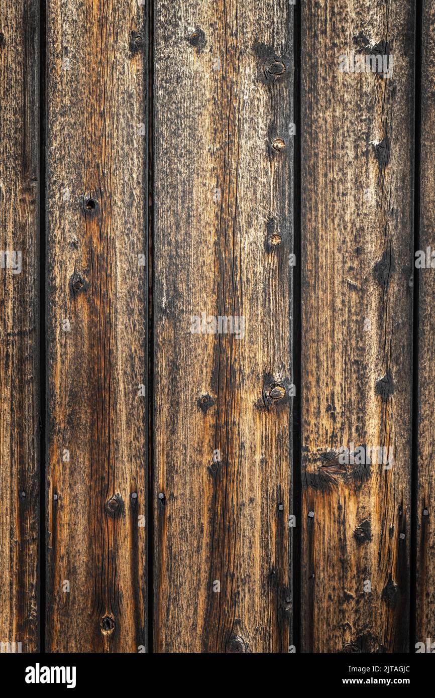 A vertical shot of aged weathered wood texture perfect for background ...