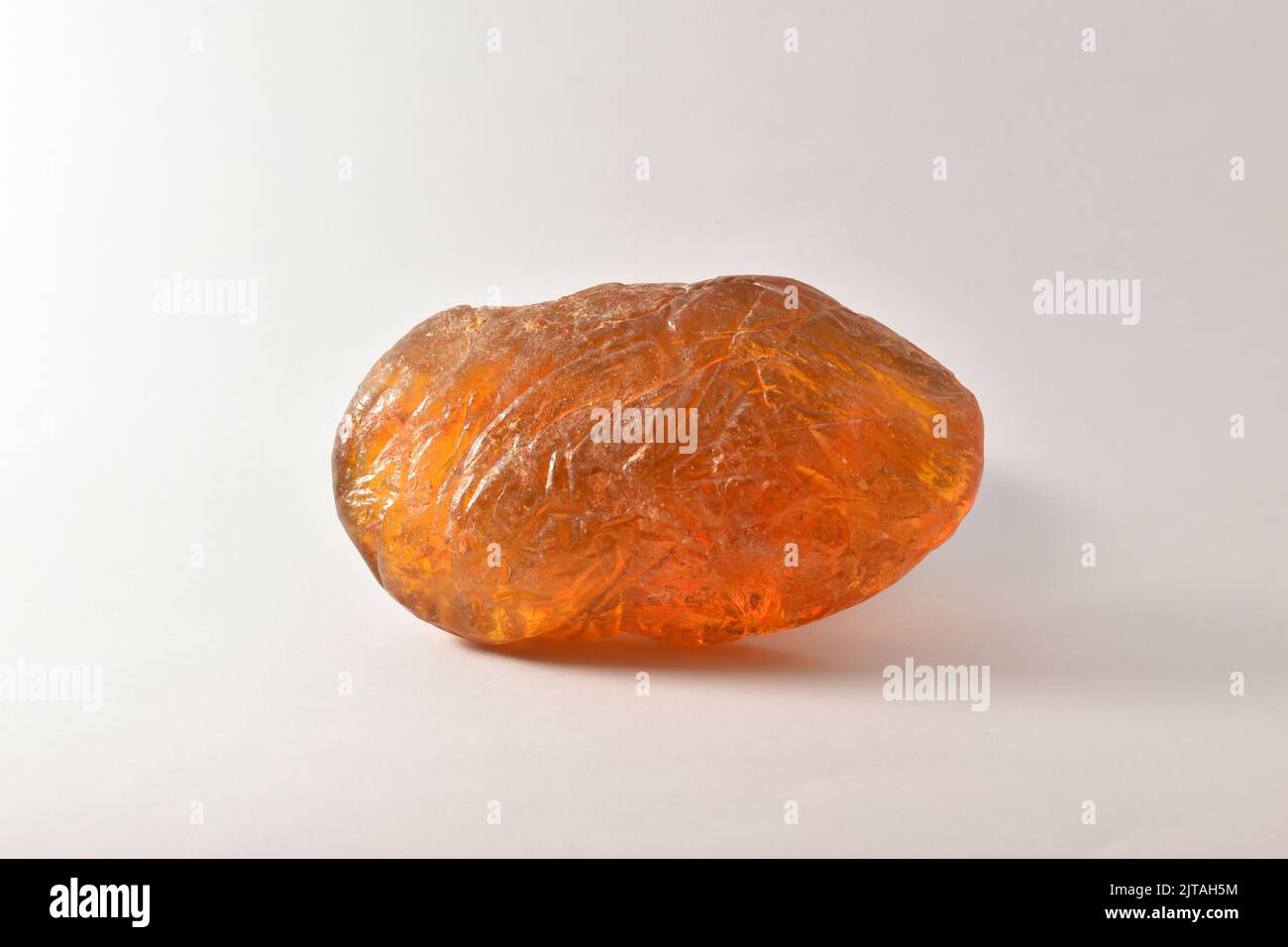 Raw colophony isolated on white background. Rosin Stock Photo - Alamy