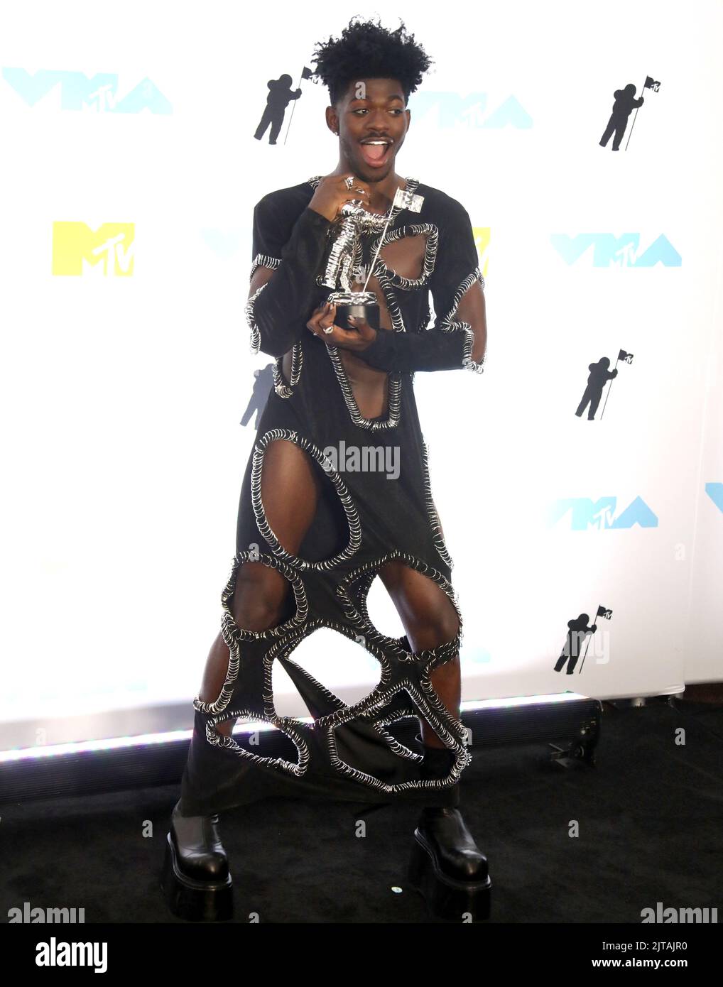 August 28, 2022, Newark, New York, USA: LIL NAS X poses for photos in ...