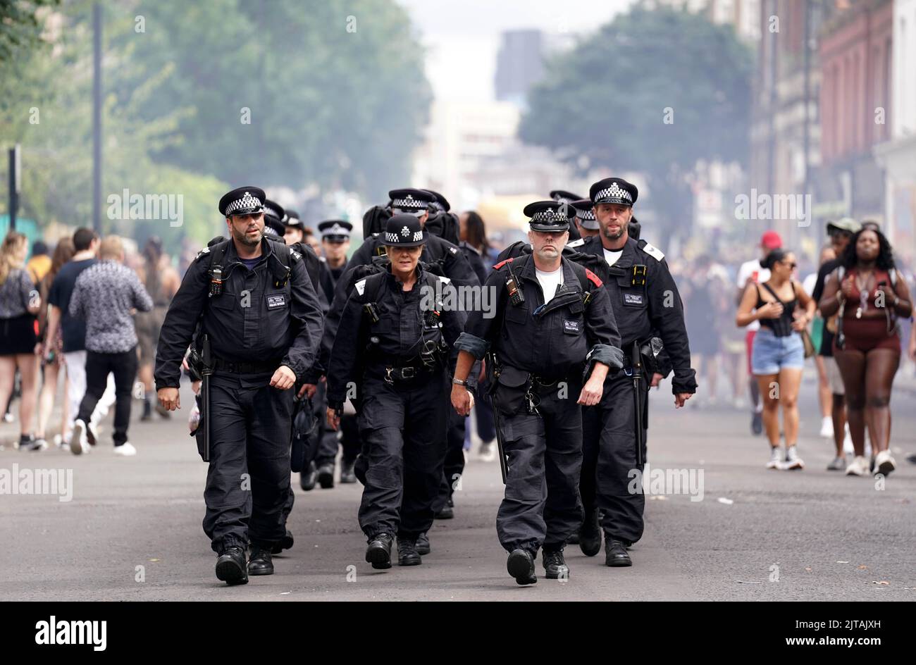 Police officers attending the Notting Hill Carnival in London, which ...