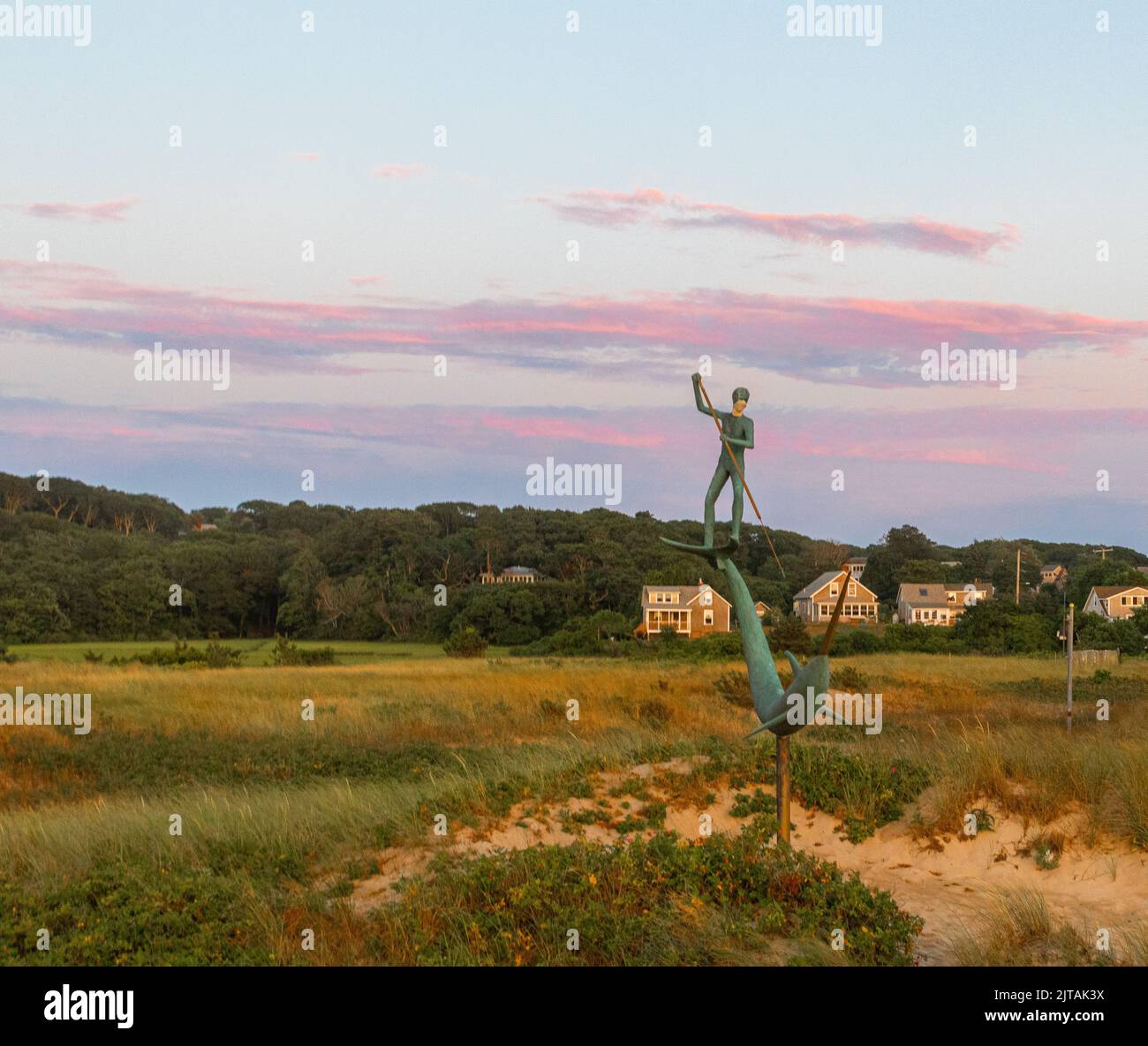 The sculpture of the harpooner during the sunset Stock Photo - Alamy