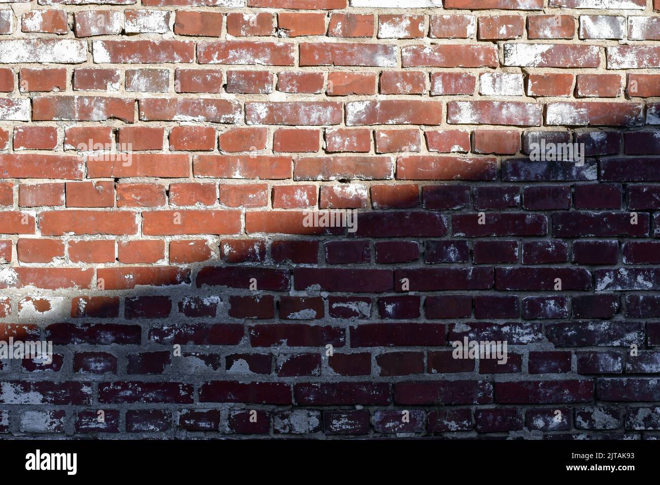 Background photo of a brick wall and shadow, concept of texture and ...