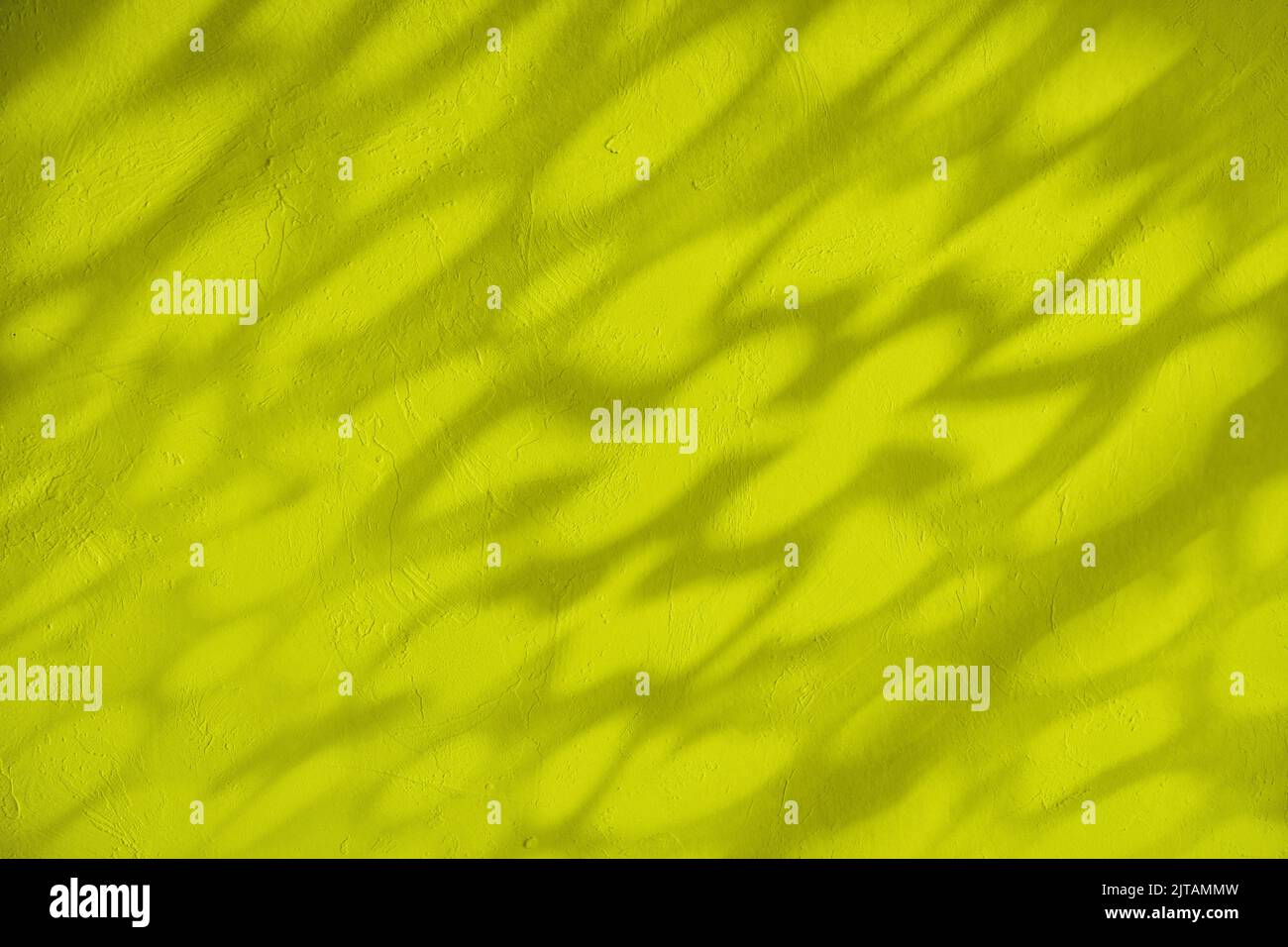 Shadow and light on solid yellow wall texture background Stock Photo ...