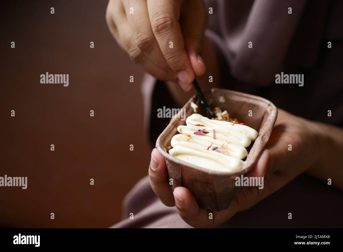 Hand spoon eating chocolate cake hi-res stock photography and images ...