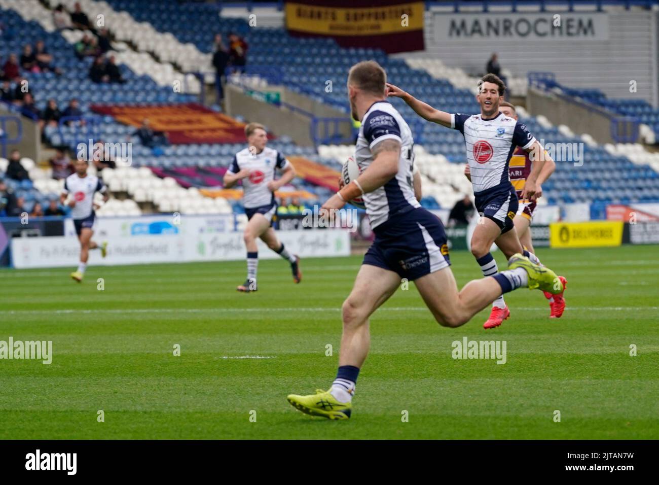 Stefan Ratchford #1 of Warrington Wolves points Matt Dufty toward the ...