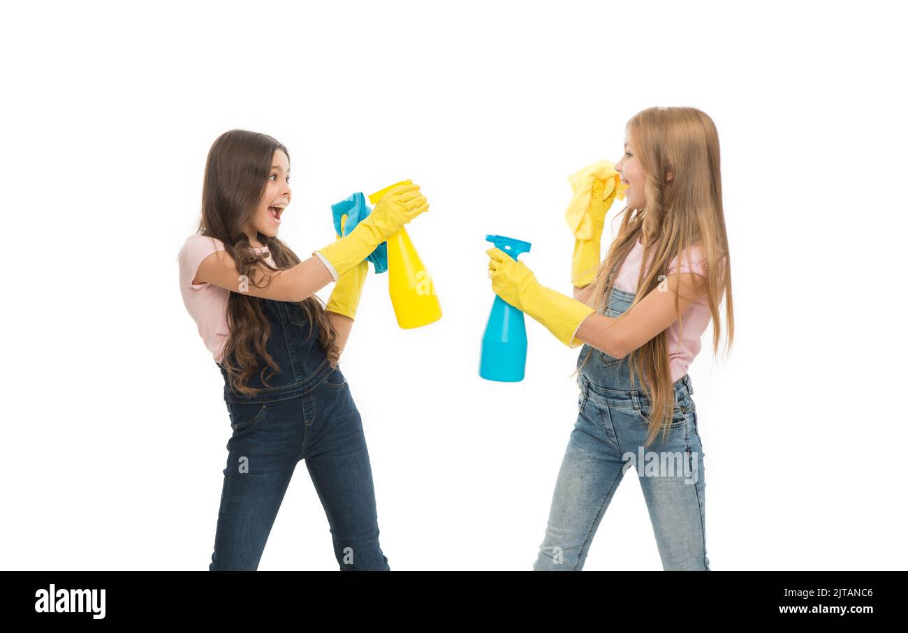 Cleaning products that work. Little girls spraying each other from ...