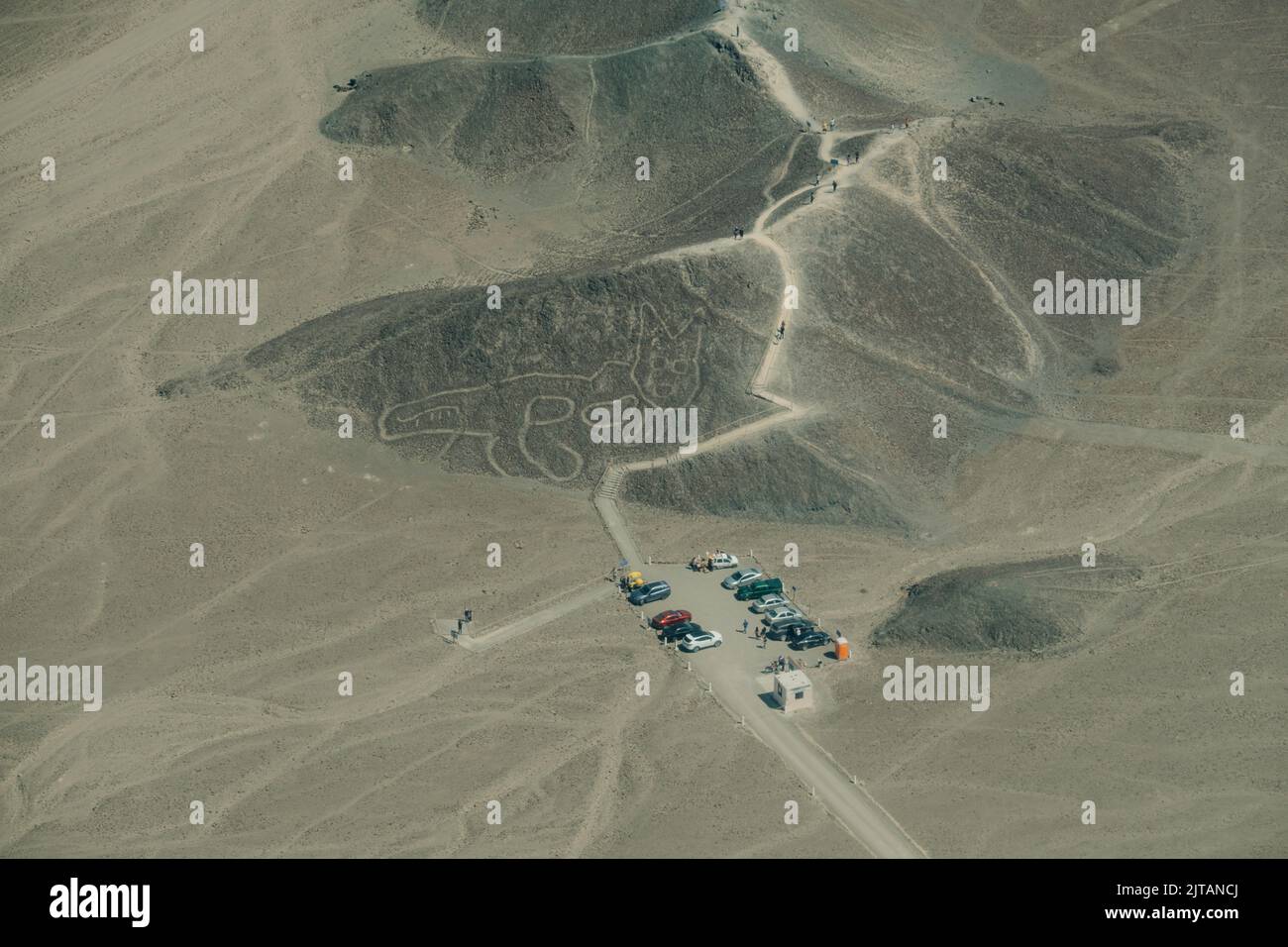 A beautiful shot of cars in Nazca Condor Lines Geoglyphs in the Nasca ...