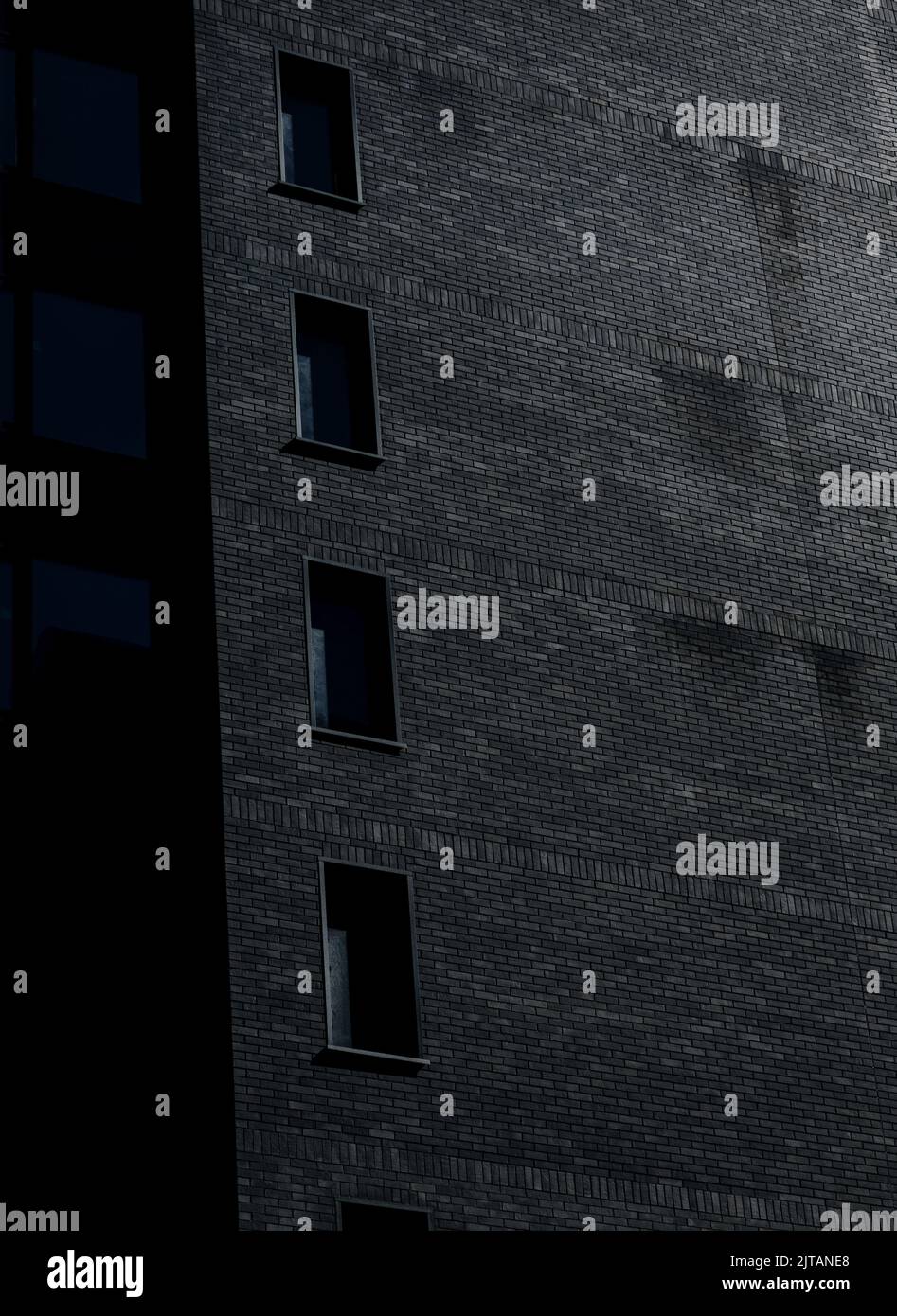 dark brick exterior in a modern style of architecture Stock Photo - Alamy