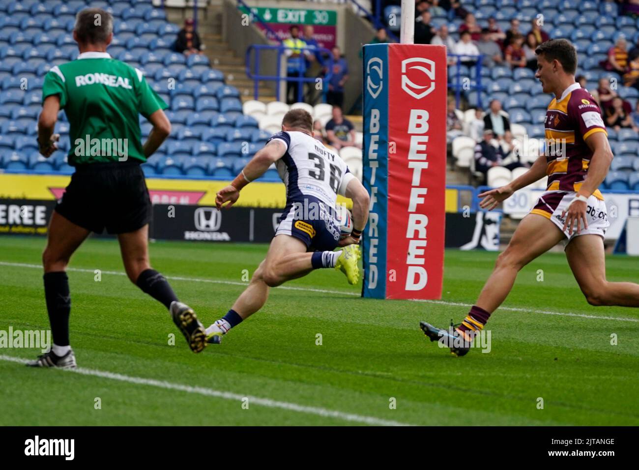 Matt Dufty #36 of Warrington Wolves touches down to score an early try ...