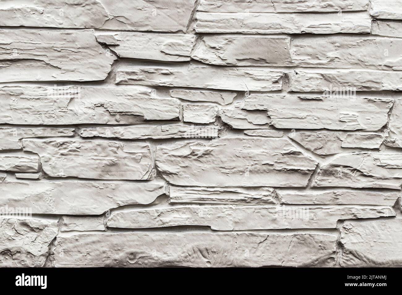 Texture of a wall covered with decorative brick-like tiles. Abstract ...