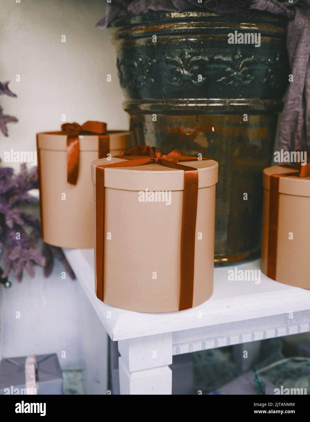 Gift boxes on table for new year. Christmas decoration Stock Photo - Alamy