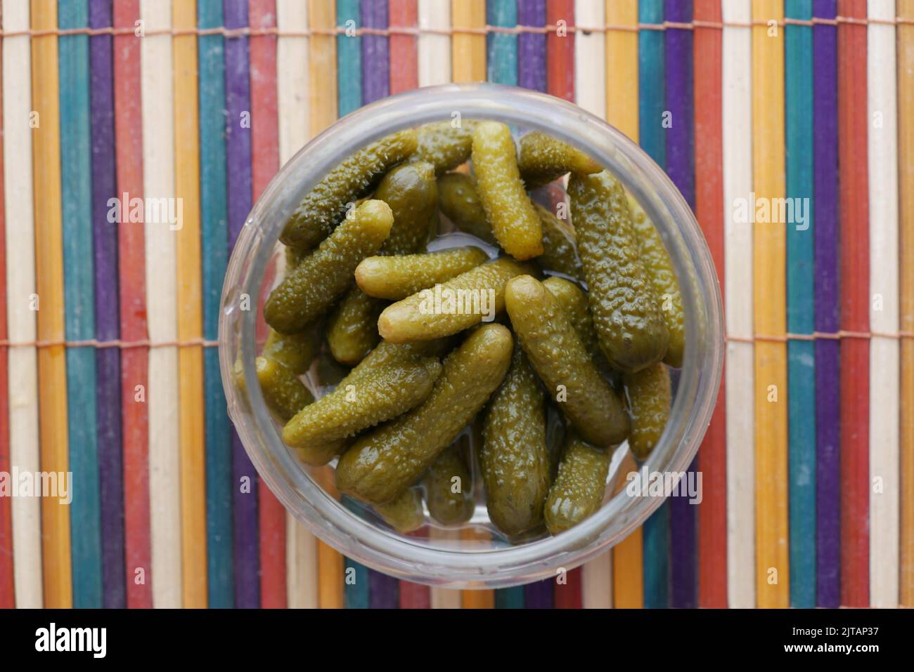 bottle of pickled cucumbers, pickles on table Stock Photo - Alamy