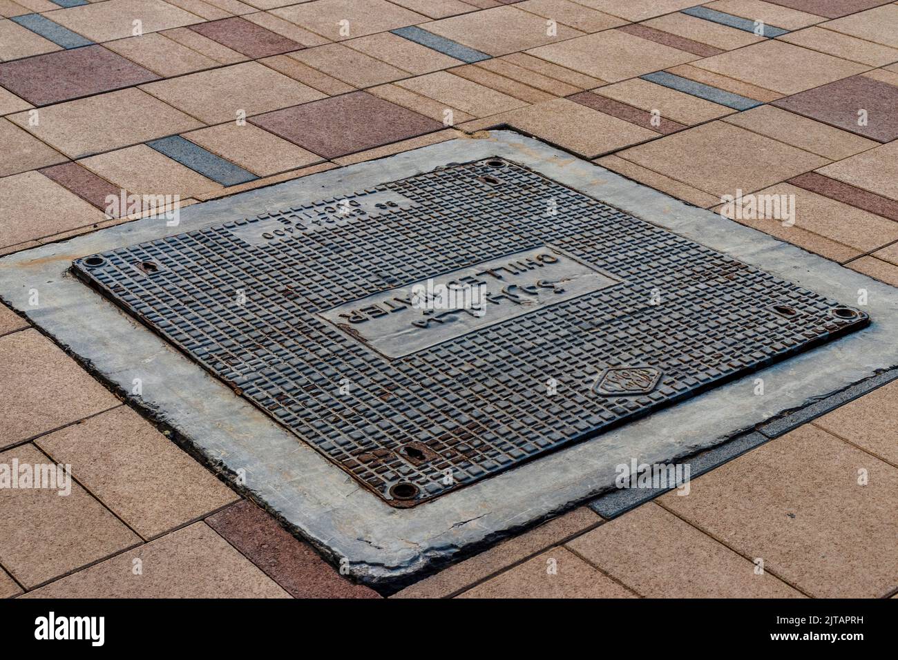 Close up shot of a chilled water manhole Stock Photo - Alamy