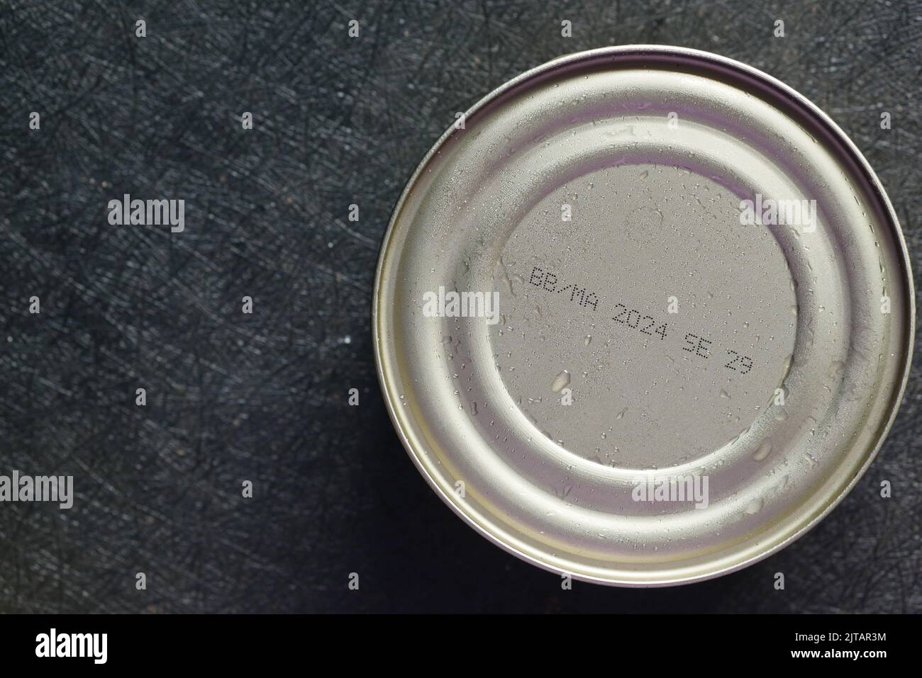 expire date on food can on white background Stock Photo - Alamy