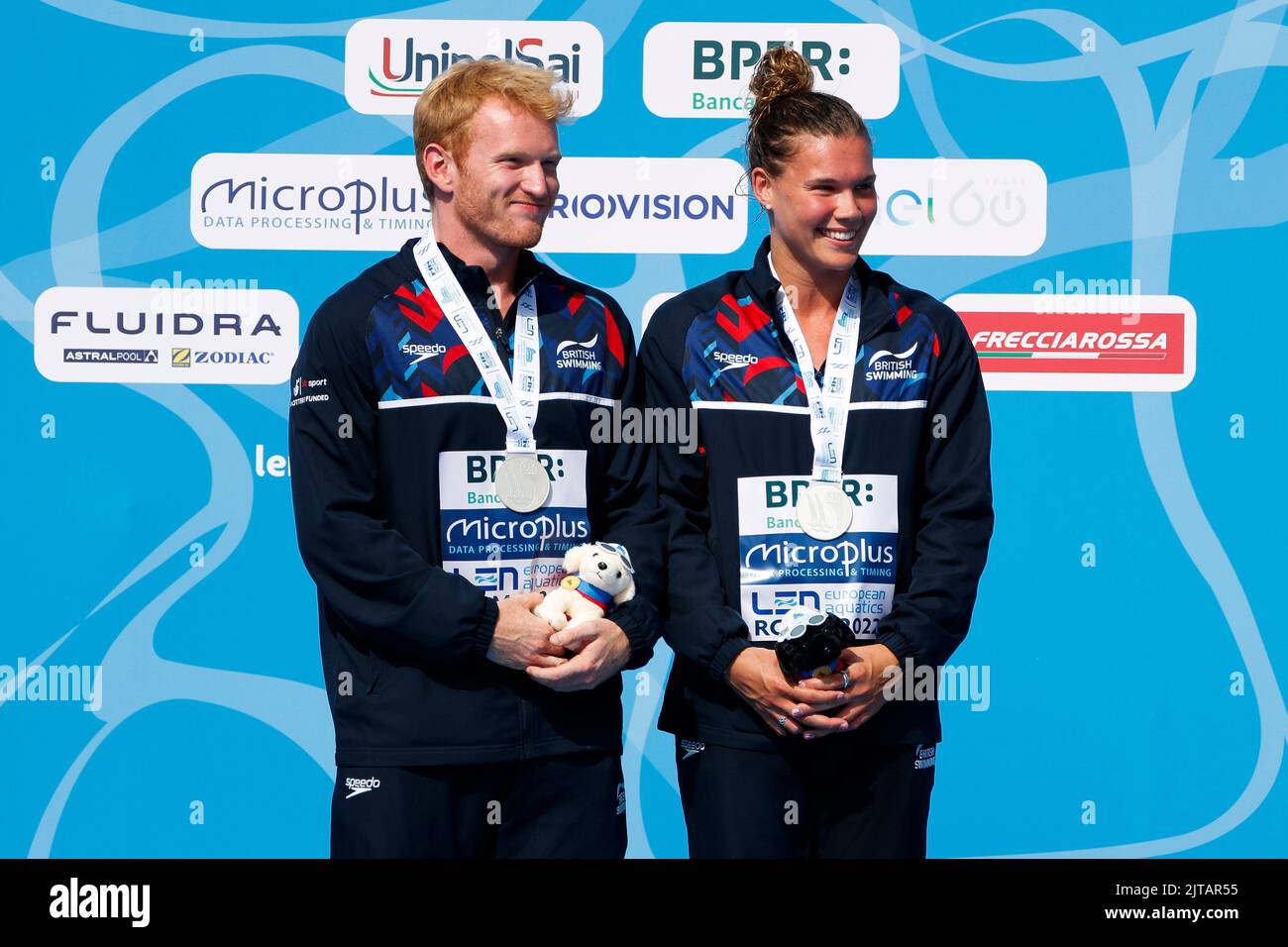 James Heatly and Grace Reid of Great Britain celebrate during the medal ...