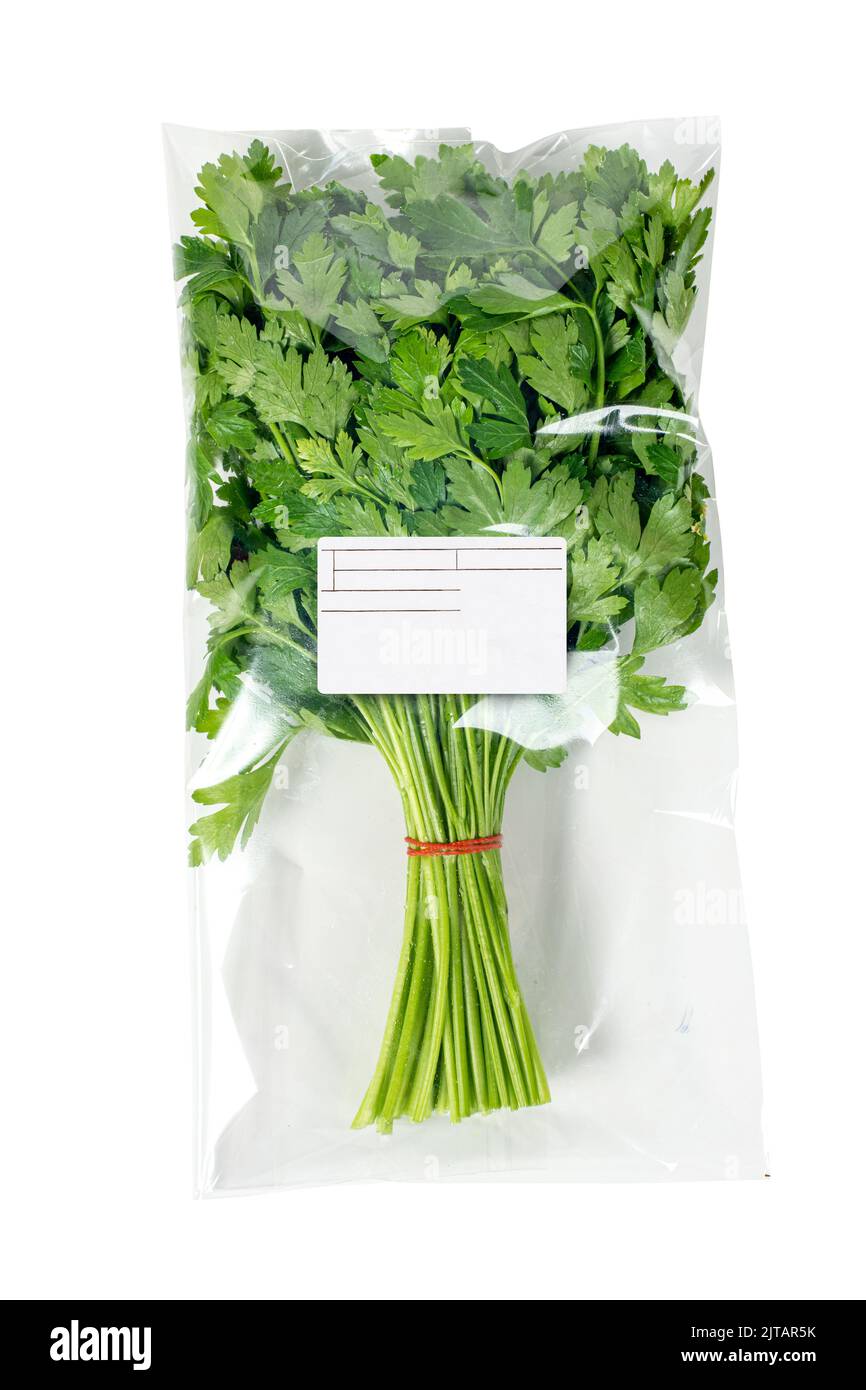 Packaged and labeled organic parsley on a white background Stock Photo ...