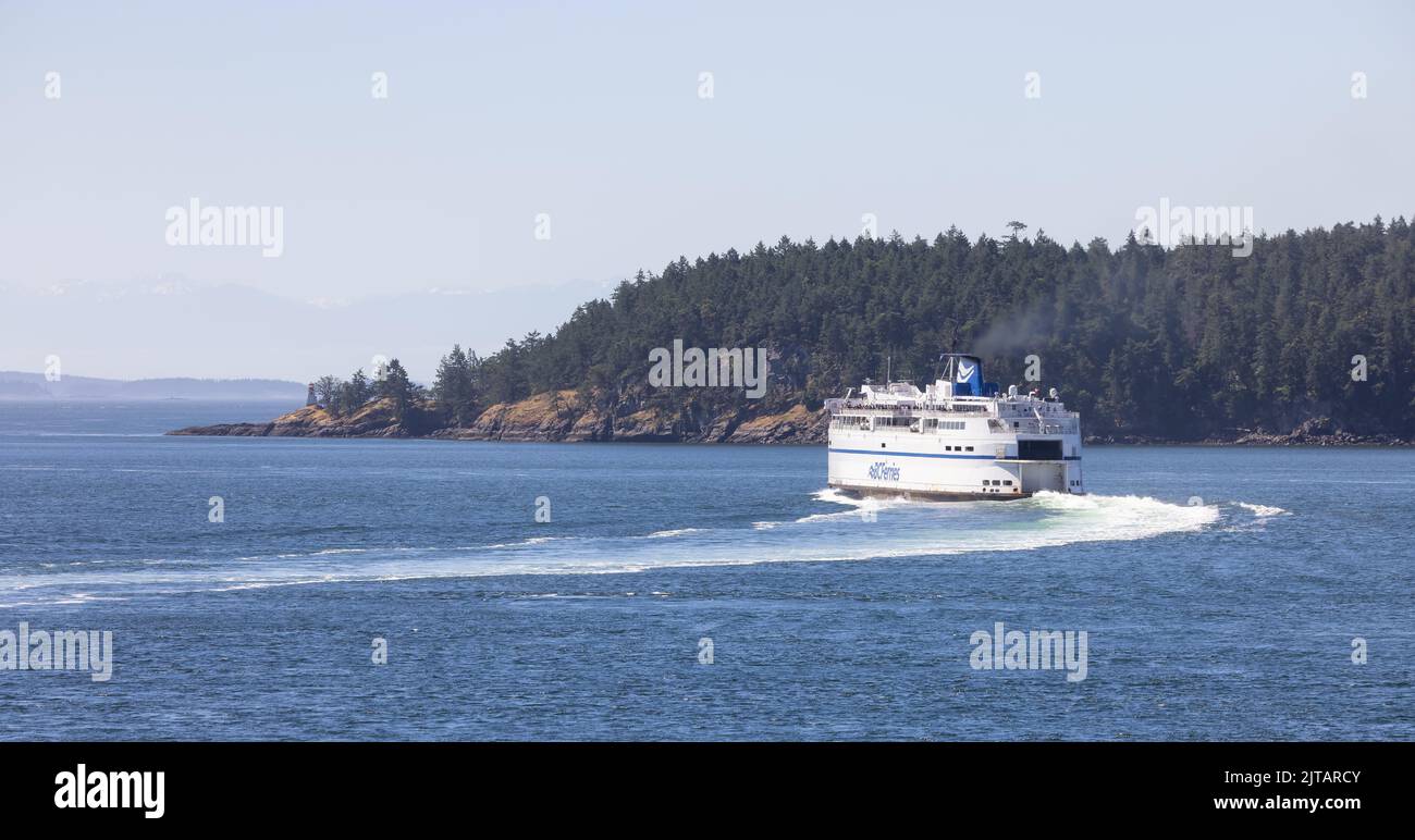 BC Ferries Passing By the islands on the West Coast of Pacific Ocean ...