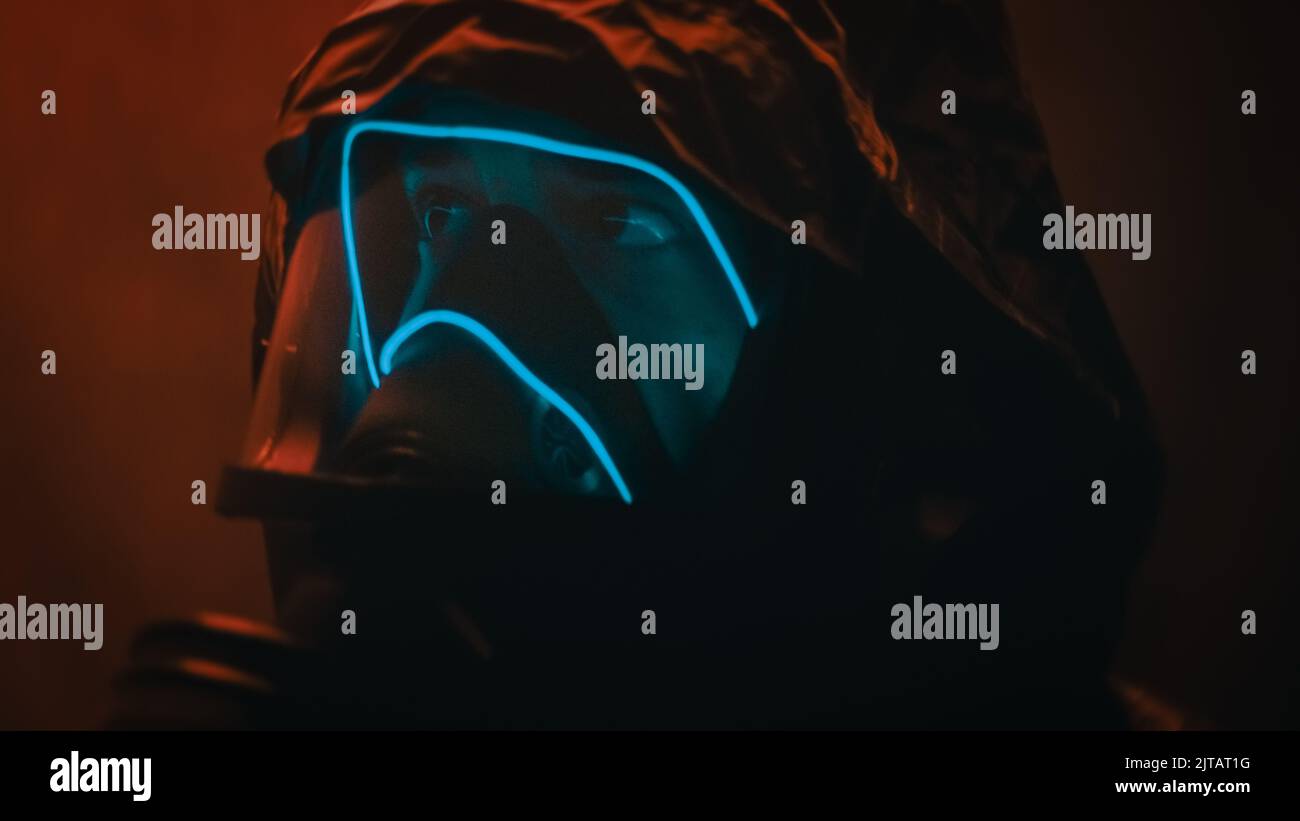 Fireman with gas mask under fire alarm lights Stock Photo - Alamy