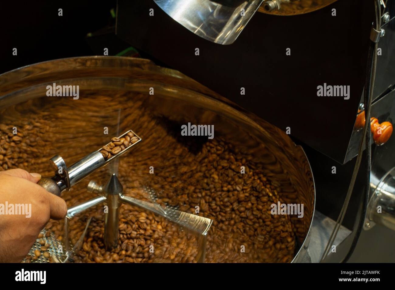 Roasted coffee machine Stock Photo - Alamy