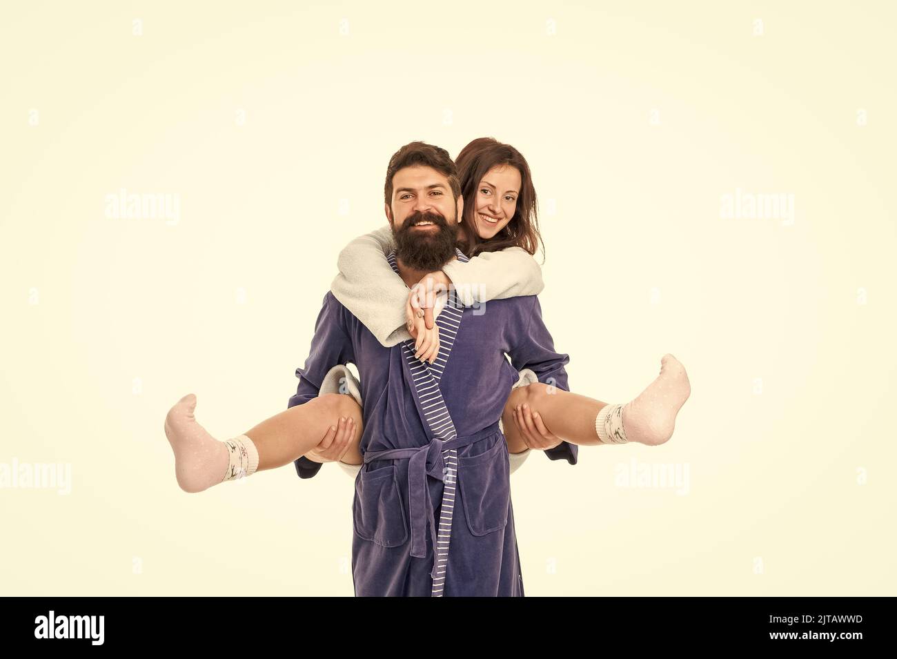 I love to drive. Happy girl ride piggyback on guy. Happy family. Couple ...