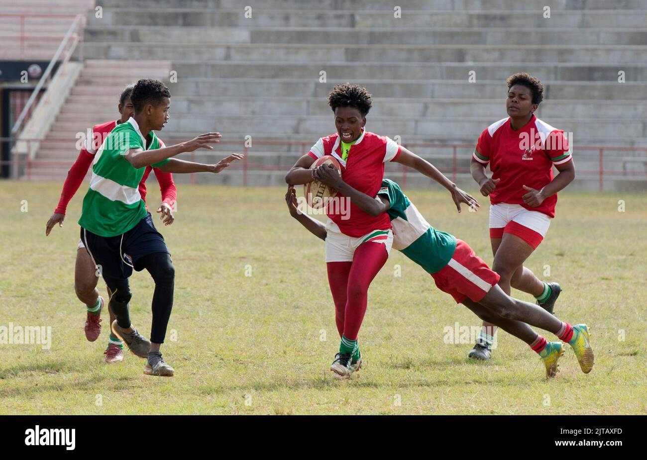 Female rugby player with ball hi-res stock photography and images - Alamy