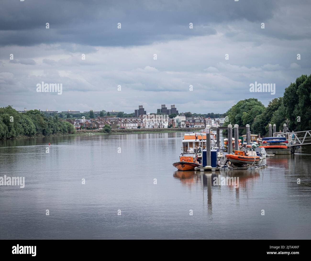 RNLI boats moored on the Thames at Chiswick lifeboat station Stock ...