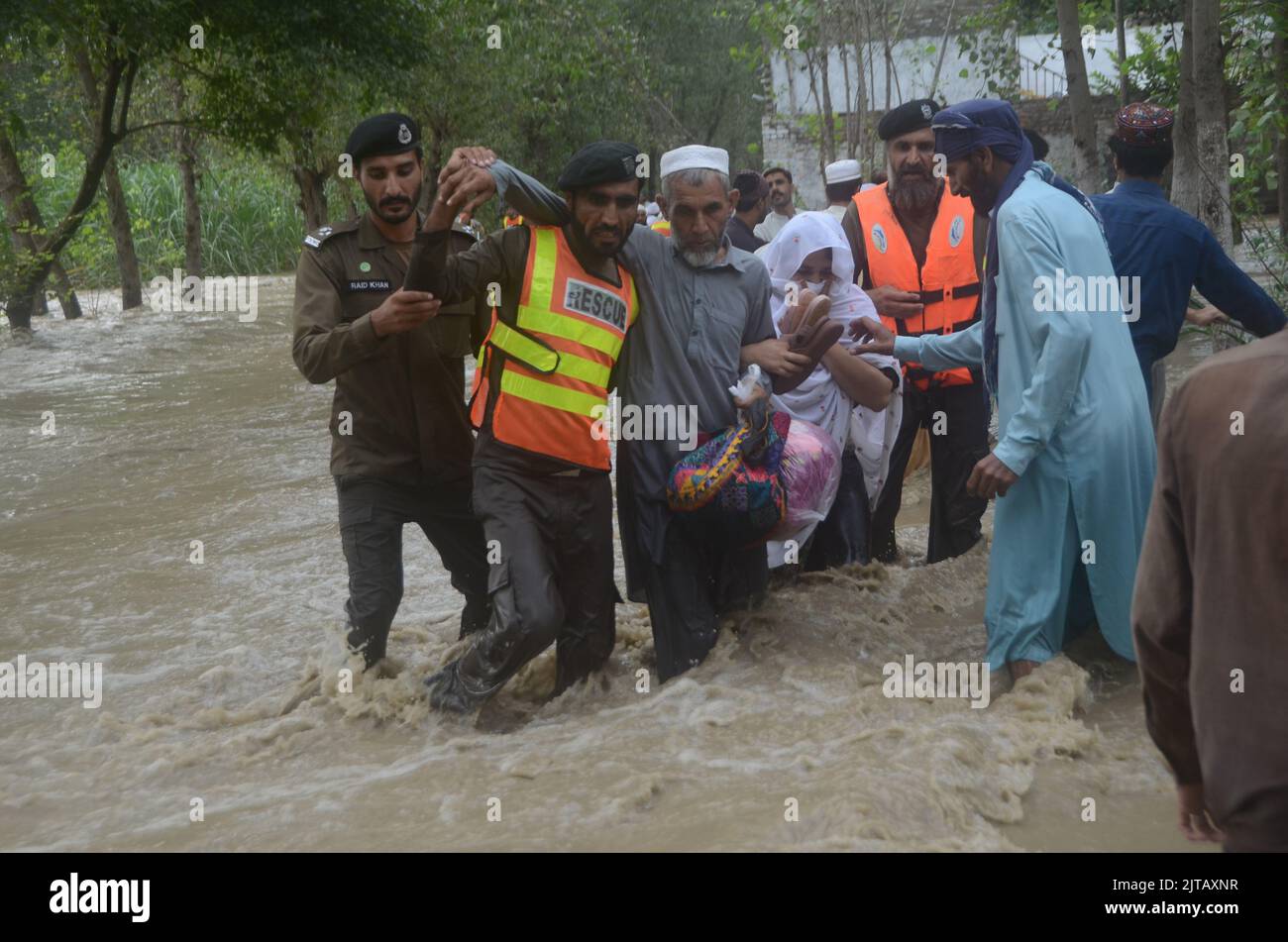 Peshawar, Pakistan. 26th Aug, 2022. Torrential rains and storms cause ...