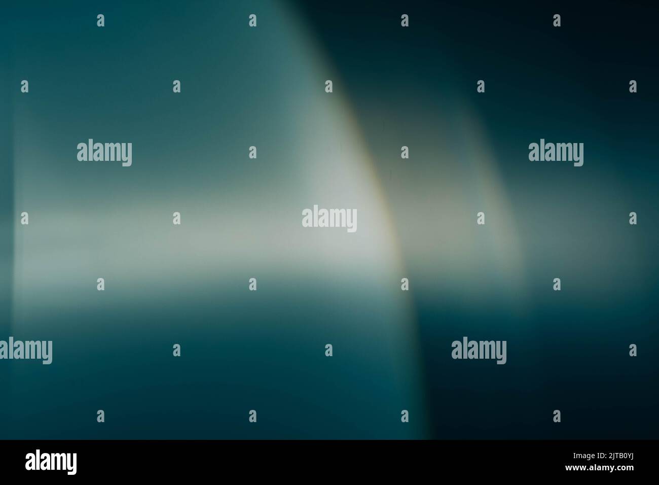 defocused glow teal blue background lens flare Stock Photo - Alamy