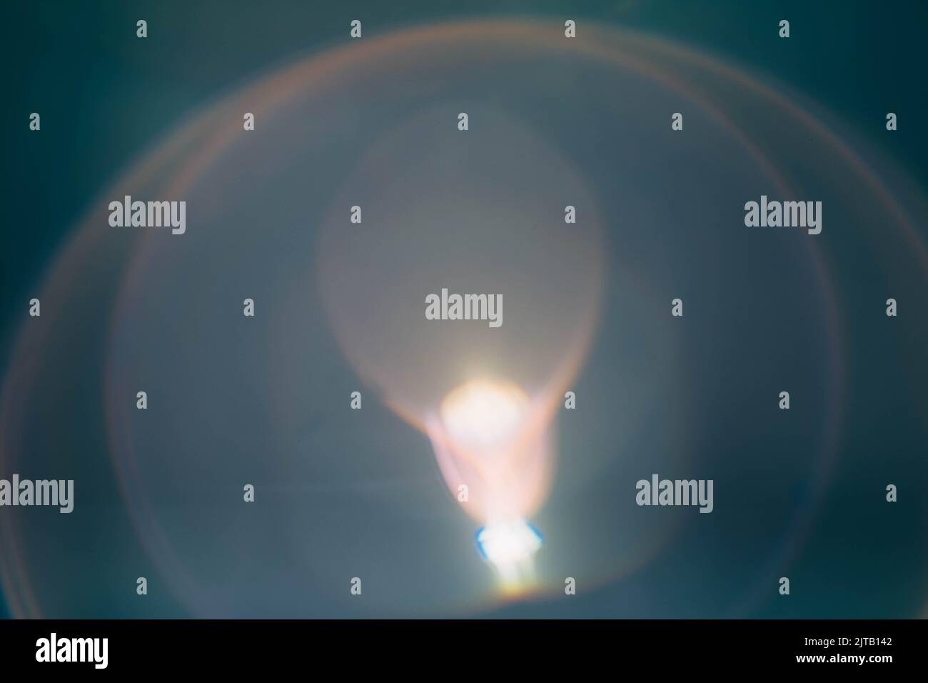 blur lens flare teal blue background bulb radiance Stock Photo - Alamy