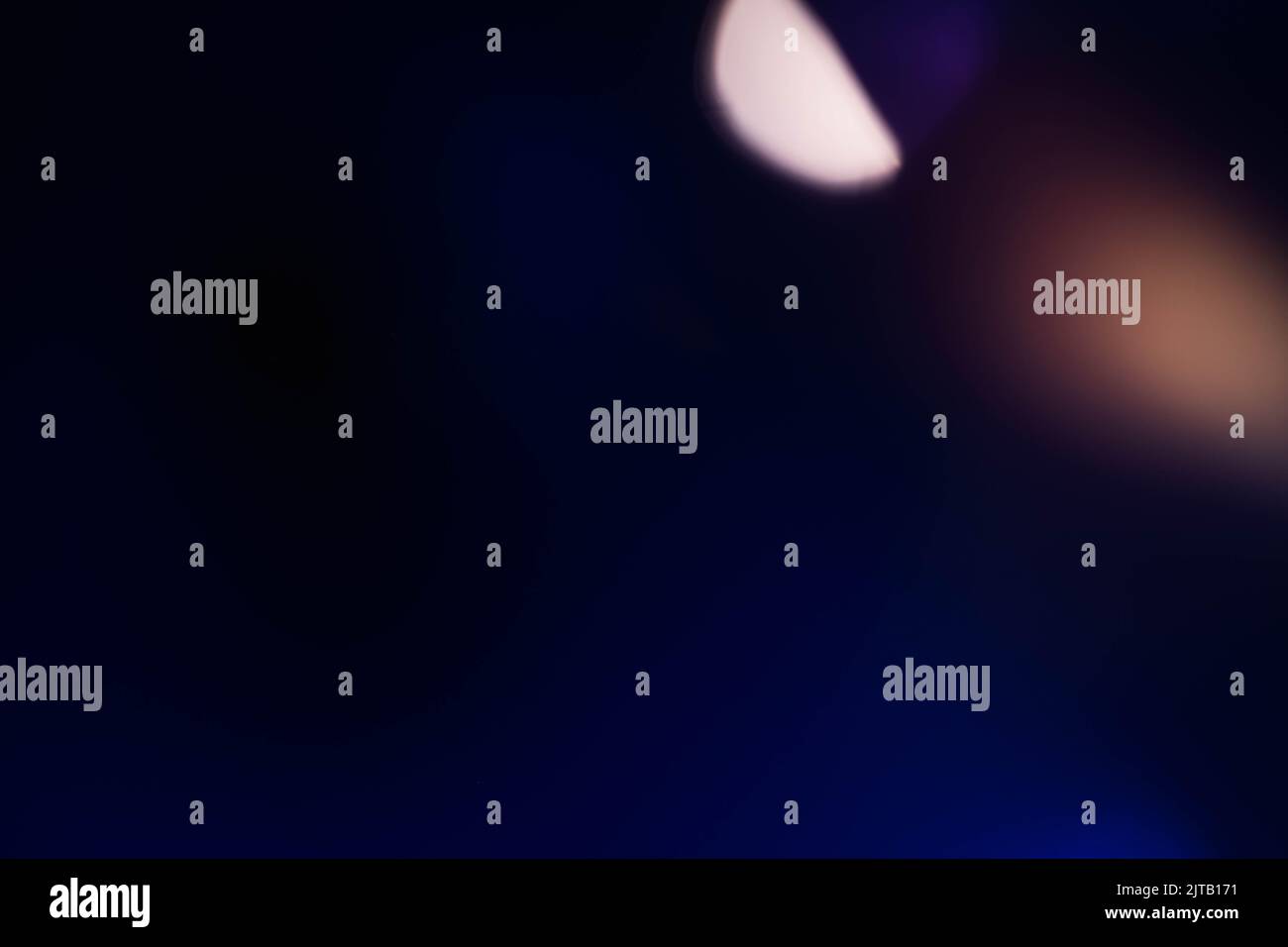 navy blue background lens flare blur night lights Stock Photo - Alamy