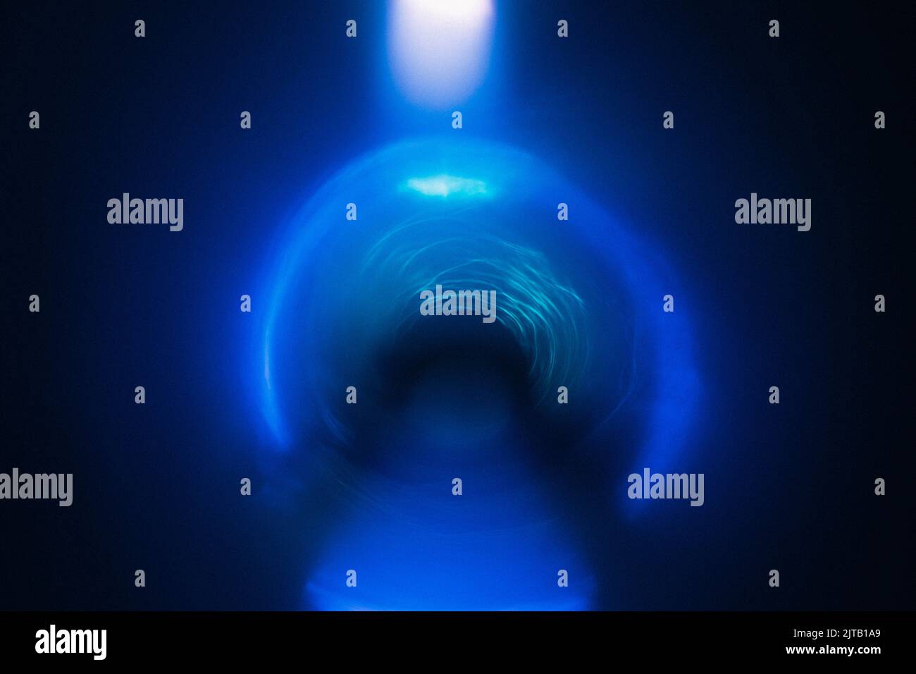 blur neon blue arc glow lens flare tunnel effect Stock Photo - Alamy